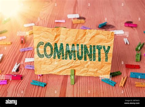 Conceptual Hand Writing Showing Community Concept Meaning Specific Population With A Common