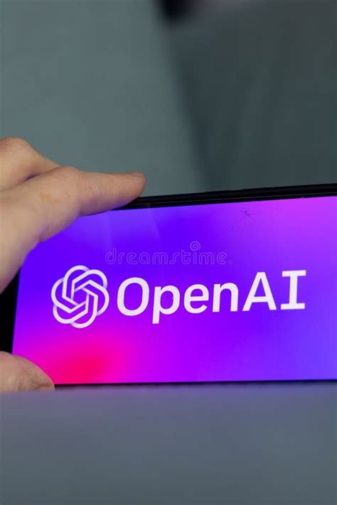 Woman S Hand Holding An Iphone With Openai Logo Chatgpt And Chat Bot Culture Artificial