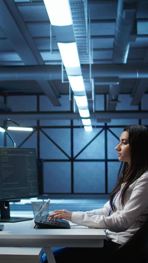 Vertical Teamworking Colleagues In High Tech Data Center Managing And Maintaining Databases