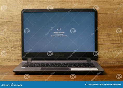 The Laptop With Windows Update On Screen Its Offers Increased Security