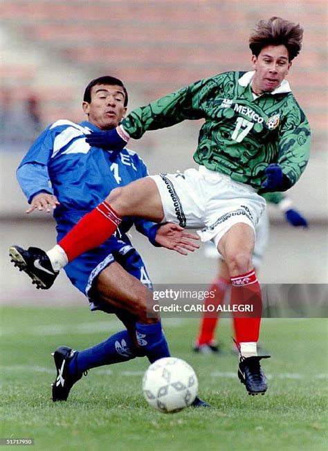Mexican Forward Daniel Deeke And Defender Carlos Hernandez Of El