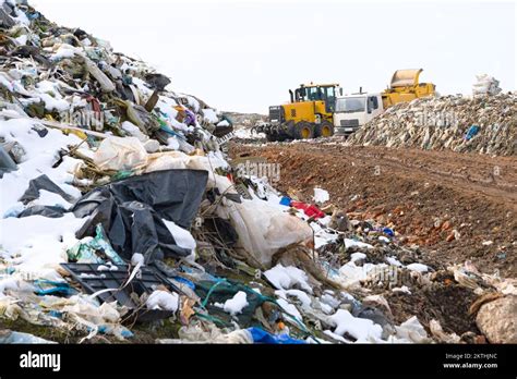 Dump Truck Unloading Garbage Over Vast Landfill Environmental Pollution Outdated Method Of
