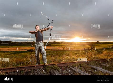Man Aiming Bow Arrow Man Hi Res Stock Photography And Images Alamy
