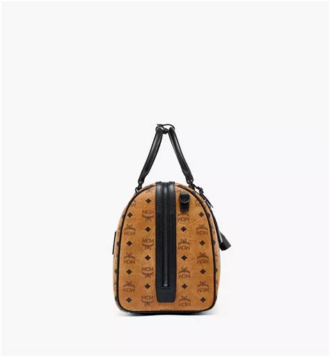 Mcm Cognac Ottomar Weekender Bag In Visetos Vip Clothing Stores