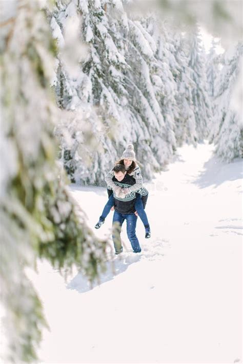 Winter Fun Couple Playful Together During Winter Holidays Vacation