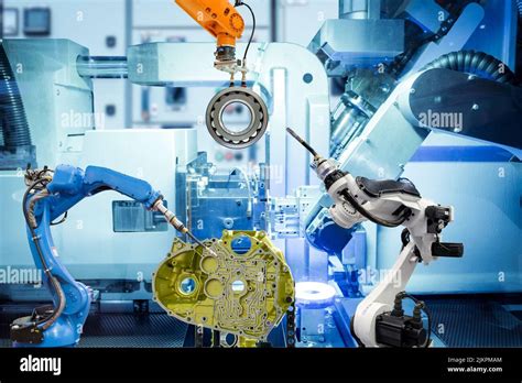 industrial automation robotic teamwork working with auto parts on smart