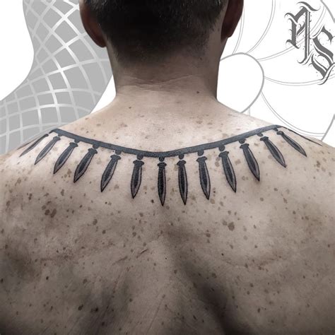 Godric Collar Tattoos