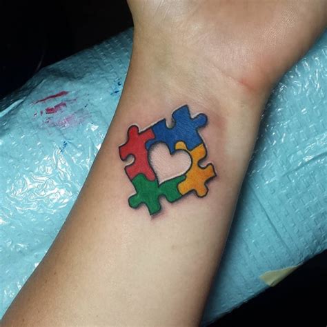 Autism Puzzle Pieces Tattoo