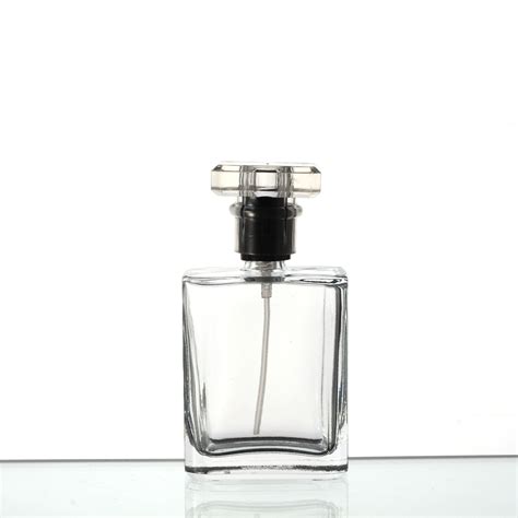 Wholesale 50ml Custom Logo Empty Square Clear Glass Perfume Bottle With Spray High Quality