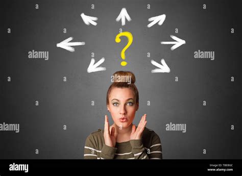 Girl With Question Marks And Direction Concept Stock Photo Alamy