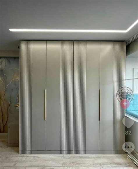 Шкаф с фрезеровкой волна Дизайн интерьера спальни Дверцы гардероба Дизайн дома