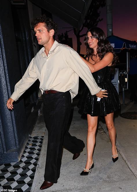 Sara Sampaio Puts On A Leggy Display In A Black Mini Dress As She