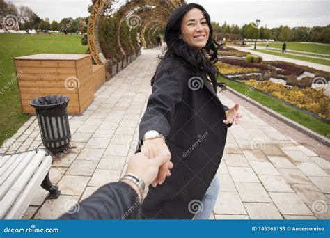 Beautiful Young Woman Holds The Hand Of A Man Stock Image Image Of