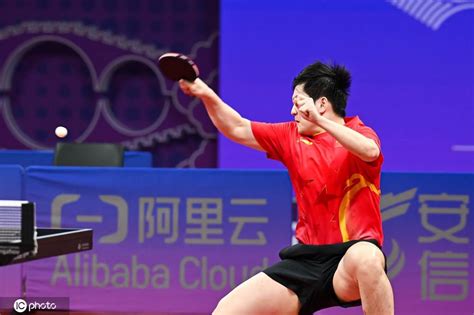 组图：乒乓球男双樊振东王楚钦夺冠 高举国旗庆祝 搜狐大视野 搜狐新闻