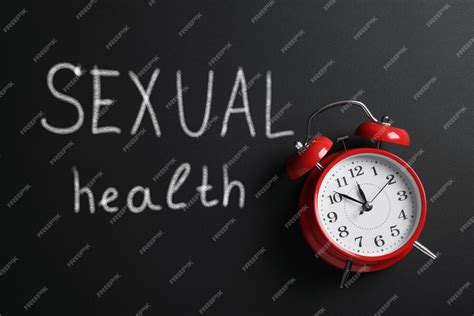 Premium Photo Sex Education Alarm Clock And Chalked Words Sexual Health On Blackboard