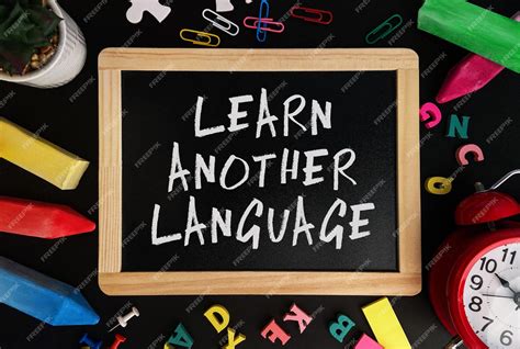 Premium Photo Wooden Board With Learn Another Language Text On A