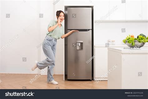 265 Asian Standing Fridge Images Stock Photos Vectors Shutterstock