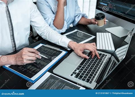 Team Of Programmer Working In Software Javascript Computer In It Office Writing Codes And Data