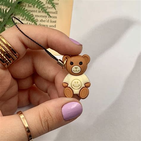 بند آویز فلش و موبایل سیلیکونی فانتزی طرح عروسکی کد 58582 قاب سنتر