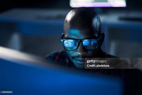 Cyber Security Black Man And Code Reflection In Eyewear Hacking And Software Update In Office