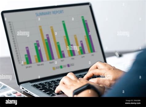 Business Data Analysis On Laptop Financial Charts Graphs Reports For