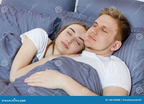 Young Cute Couple Sleeping Together In Bed Comfortable Bed And