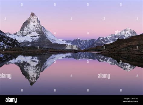 Matterhorn At Sunrise In Winter With Reflection In The Riffelsee