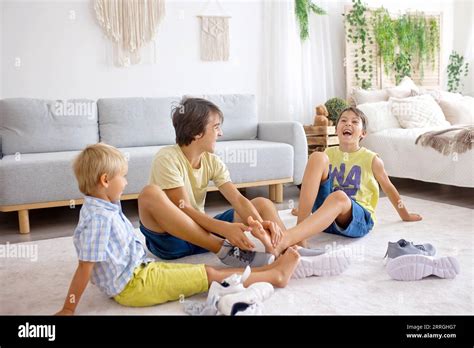 Brother Sharing Foot At Jack Belser Blog