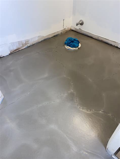 Applied A 2nd Coat Of Self Leveler On Top Of Concrete Subfloor After I Messed The First Up A Bit