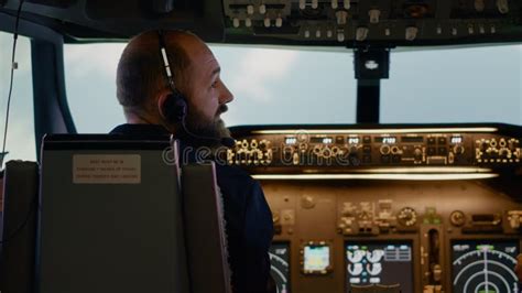 Airline Captain Pilot In Uniform Preparing For Flight At Airport Treminal Gate Stock Video