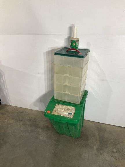 Feed Style Flip Lid Tote Stackable Bins And A Roll Of Stretch Wrap