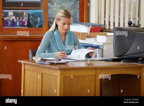 Marking Like Theres No Tomorrow A Young Teacher Marking Tests Stock