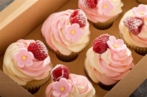 Premium Photo Pink Vanilla And Raspberry Cupcakes