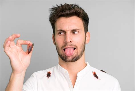 Premium Photo Young Handsome Man Isolated With Cockroachs