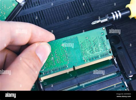 A Technician Installs A RAM In A Laptop Computer Random Access Memory Stock Photo Alamy