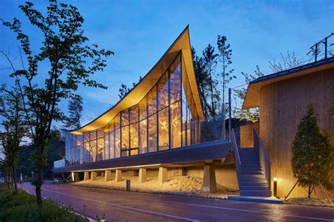 Tree Like Columns Show The Craftsmanship Inside This Riverside Pavilion