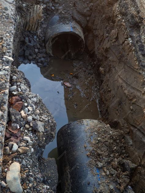 Premium Photo Works On The Replacement Of Sewer Pipes Thick Pipes