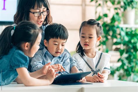 Students Learning In Classroom By Stocksy Contributor Maahoo Stocksy