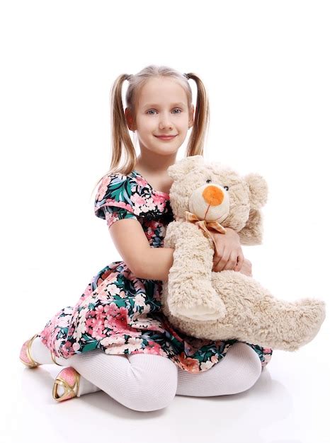 Free Photo Cute Girl With Her Teddy Bear