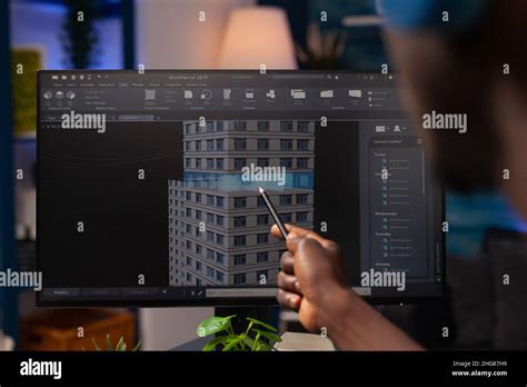 Architect Engineer Pointing At Architectural Building Prototype Analyzing Construction Model On