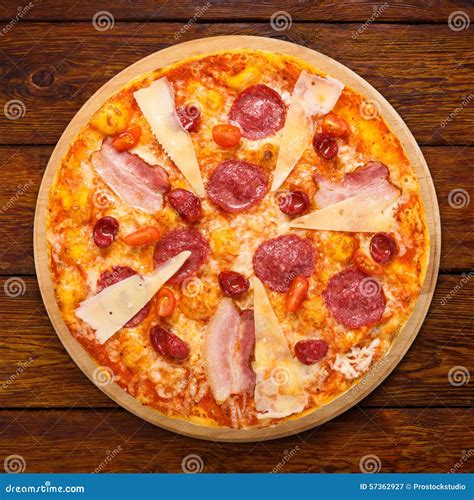 Delicious Italian Pizza With Salami Bacon And Parmesan Stock Image