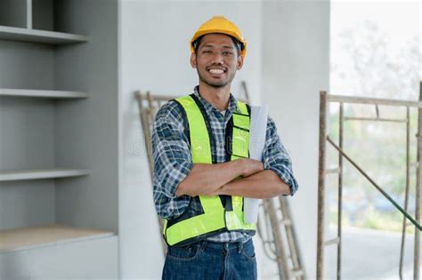 Multi Ethnic Engineer Brainstorming And Measuring For Cost Estimating