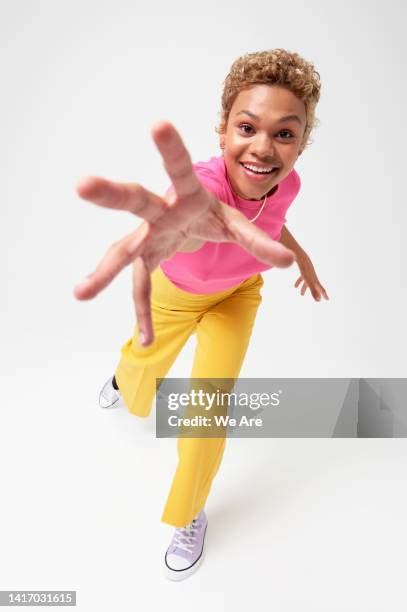 Woman Reaching Arms Toward Camera Smiling Photos And Premium High Res