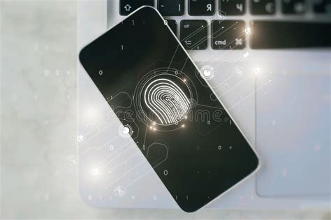 Top View Of Mobile Phone And Laptop On White Desktop With Glowing Fingerprint Hologram And Icons