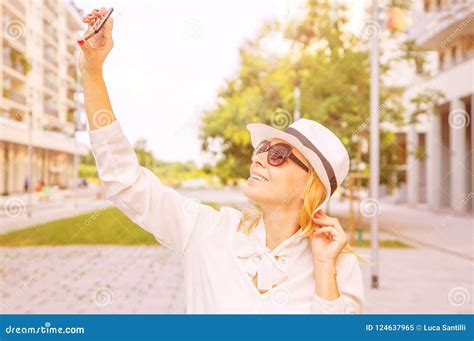 Smiling Woman Taking Selfie In A Sunny Day Stock Image Image Of