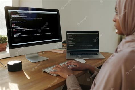 Premium Photo Focus On Hands Of Young Muslim Female Programmer