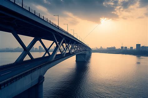 日落贯穿河流的桥梁高清图片下载 正版图片600889089 摄图网