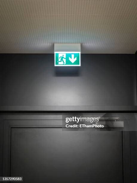 Exit Sign Hanging From Ceiling Photos And Premium High Res Pictures Getty Images