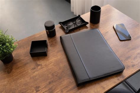 Premium Photo Laptop Folder On The Desktop Of The Head Of The Company