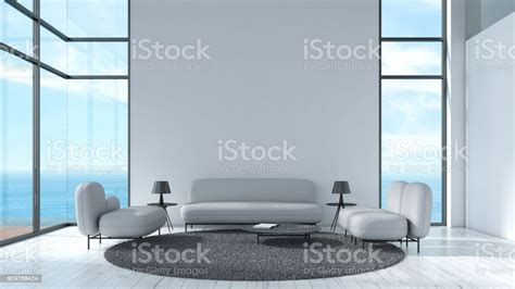 템플릿 사용 하 여 회색 소파와의 자 창 바다 보기 여름 모의 3d 렌더링을 위한 현대적인 인테리어 거실 나무 바닥 흰색 질감 벽 최소한의 거실 디자인 모형에 대한 스톡